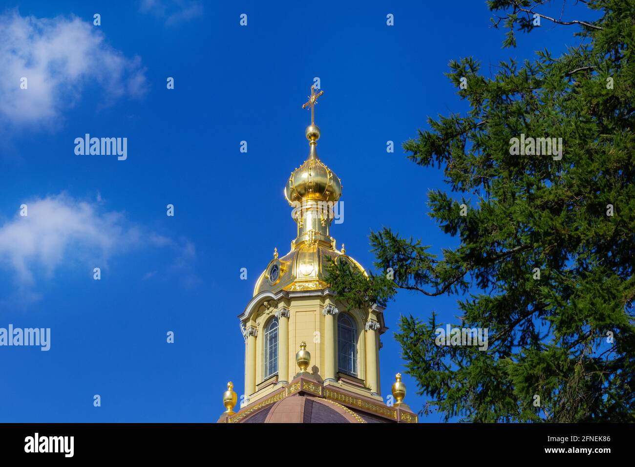Gilded upper part of orthodox Christian temple against background of ...