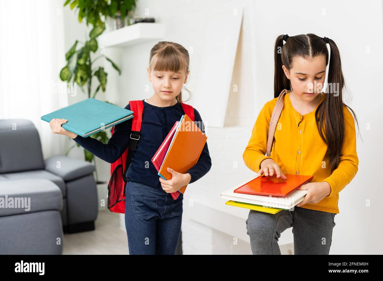 Two pupils of elementary school, Back to school Stock Photo - Alamy