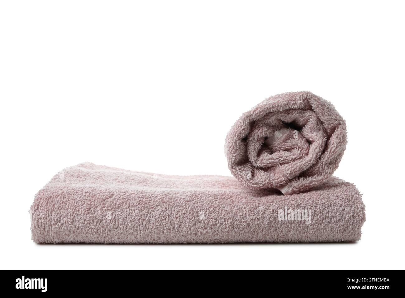 Folded clean towels isolated on white background Stock Photo - Alamy