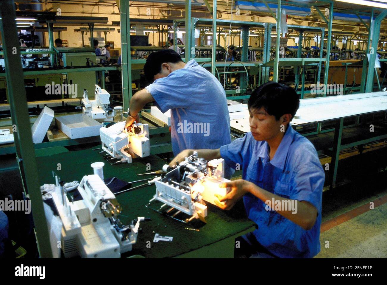 Sewing machine production in a newly built factory of the Canadian ...