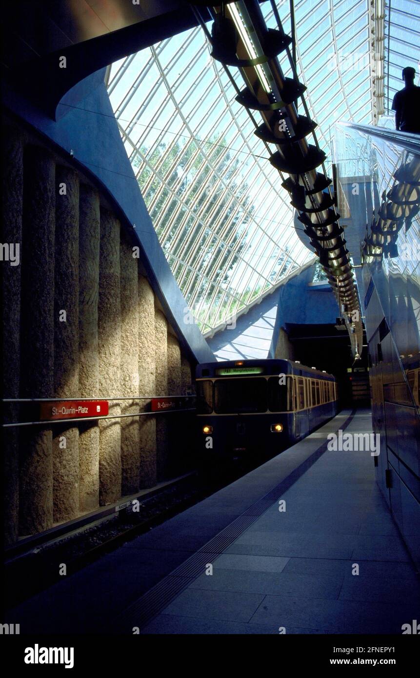 Train arriving at the platform under the glass dome with view to the ...