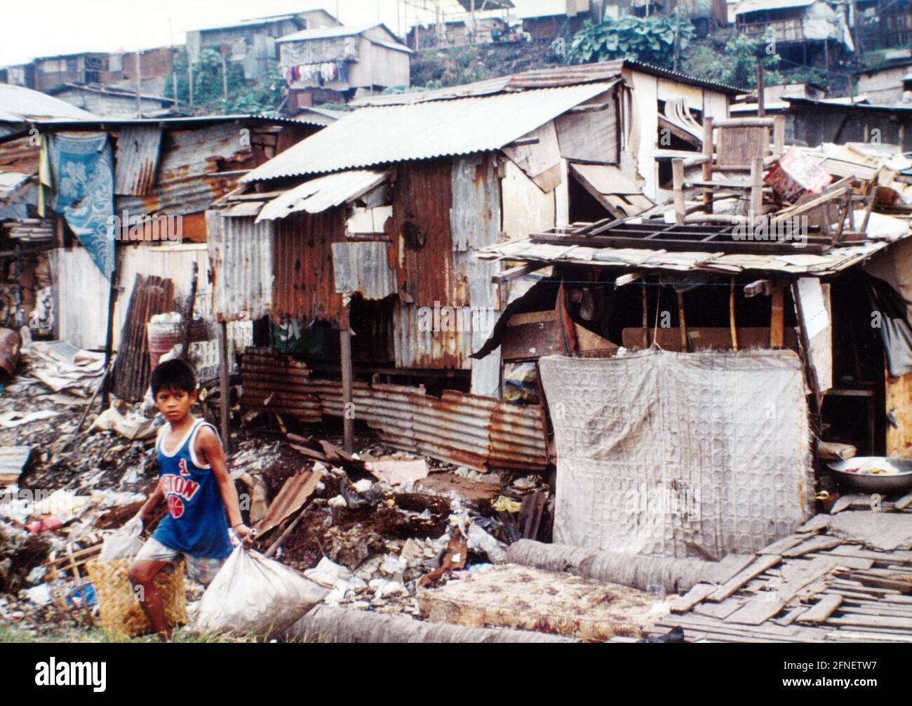 Poor shacks in a slum area of the Philippine capital Manila. [automated ...