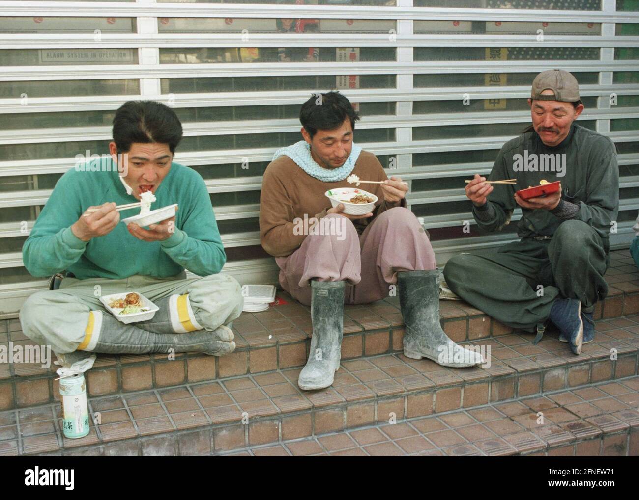 Construction workers having lunch. [automated translation] Stock Photo ...