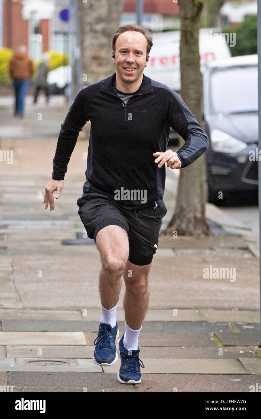 Health Secretary Matt Hancock is seen smiling as he leaves his West ...