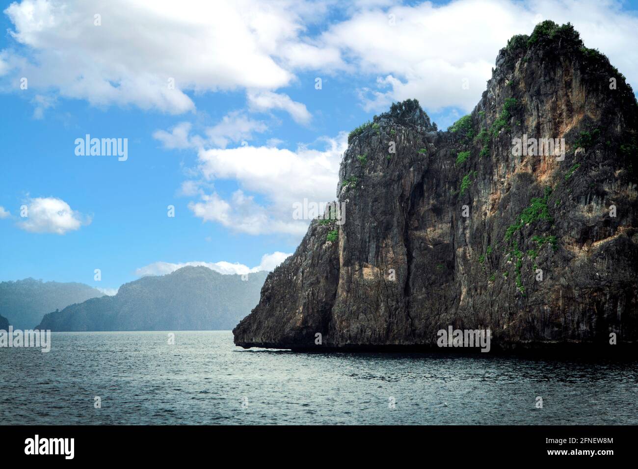 A beautiful and pristine small remote island view from the boat Stock ...