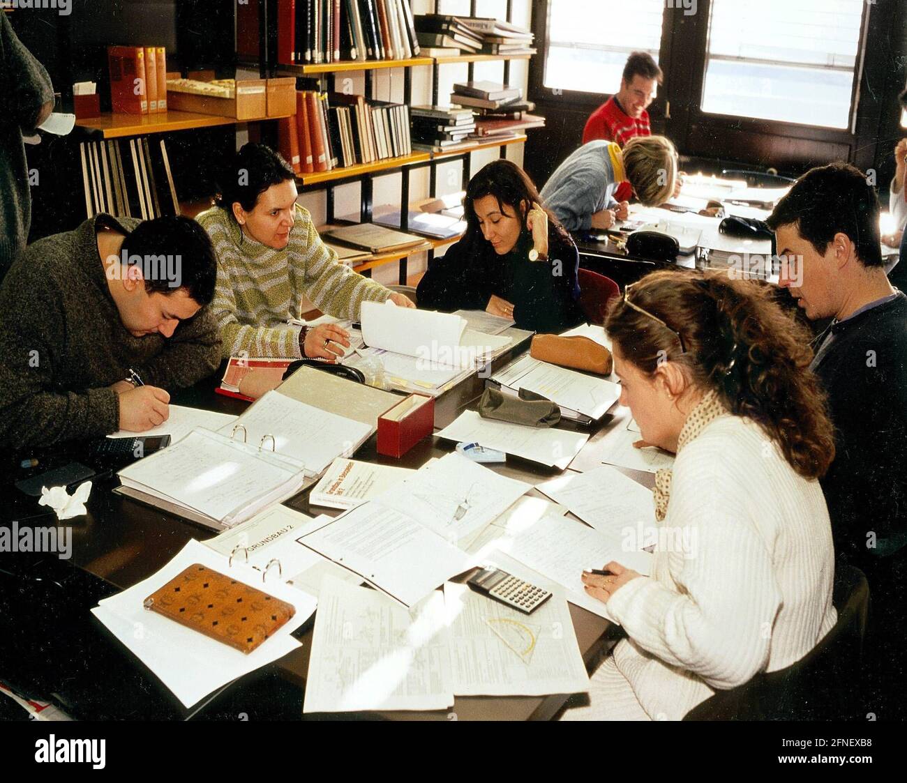 Student in the natural science library of the University of Essen. The ...