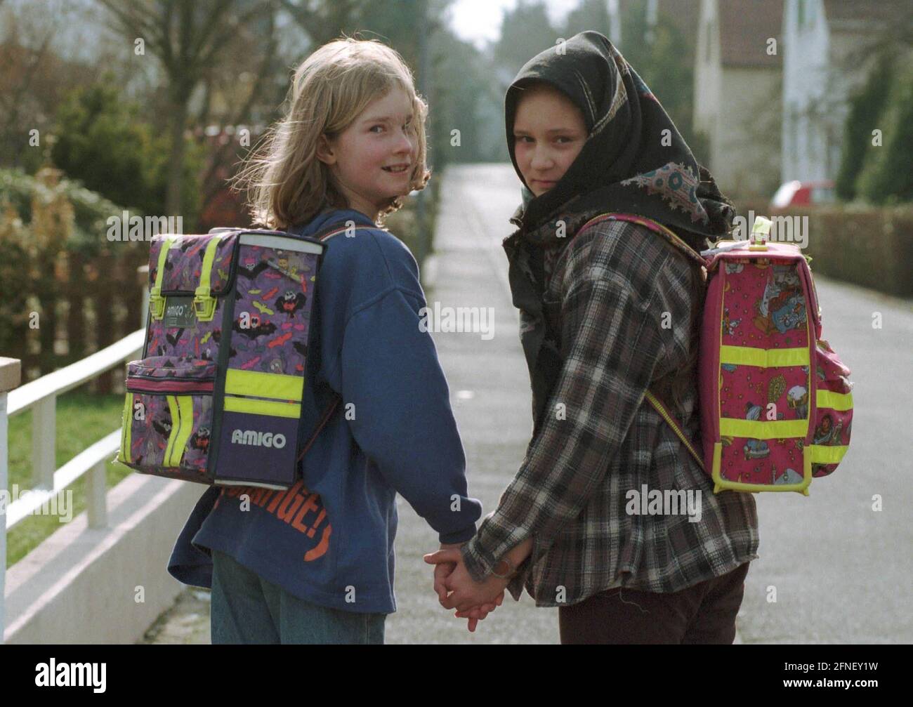 A German and a Turkish girl come together from school. [automated ...