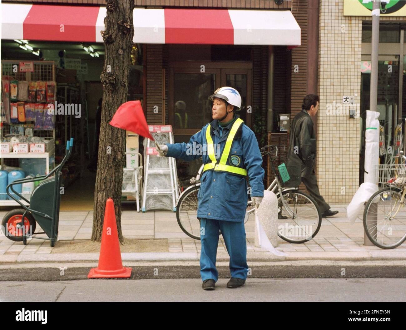 Traffic control at a construction site in Kyoto. [automated translation ...