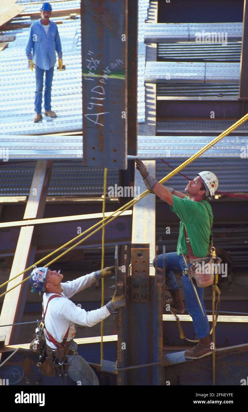 Workers building a skyscraper in San Francisco. The men often walk ...