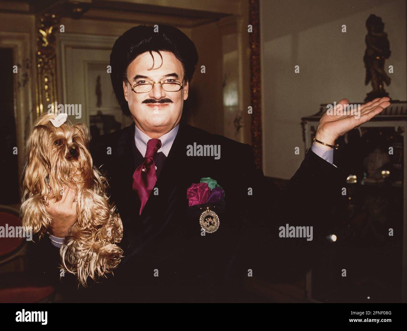 Rudolph Moshammer, fashion designer, with his dog Daisy. [automated ...