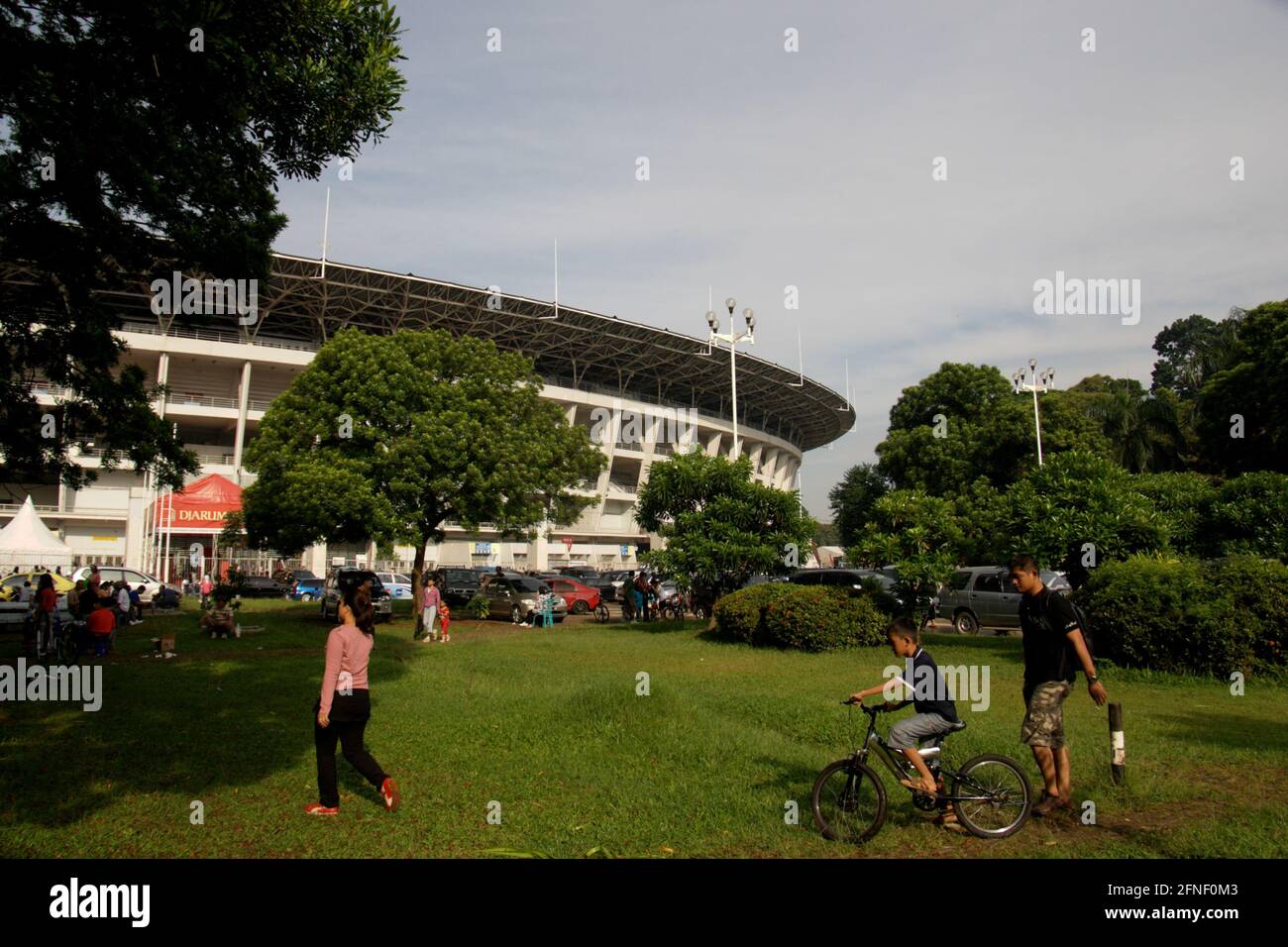 People having recreational sport activity outside Senayan Main Stadium ...
