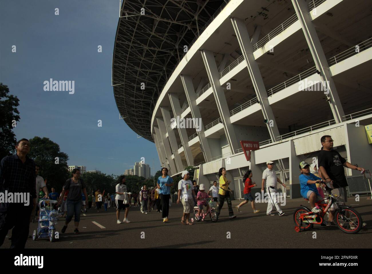 People having recreational sport activity outside Senayan Main Stadium ...