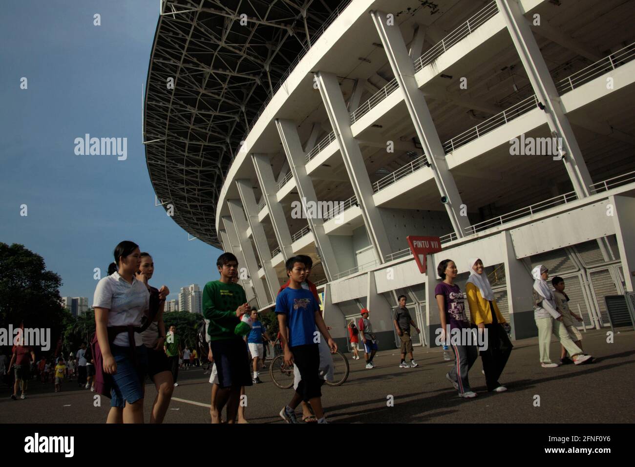 People having recreational sport activity outside Senayan Main Stadium ...