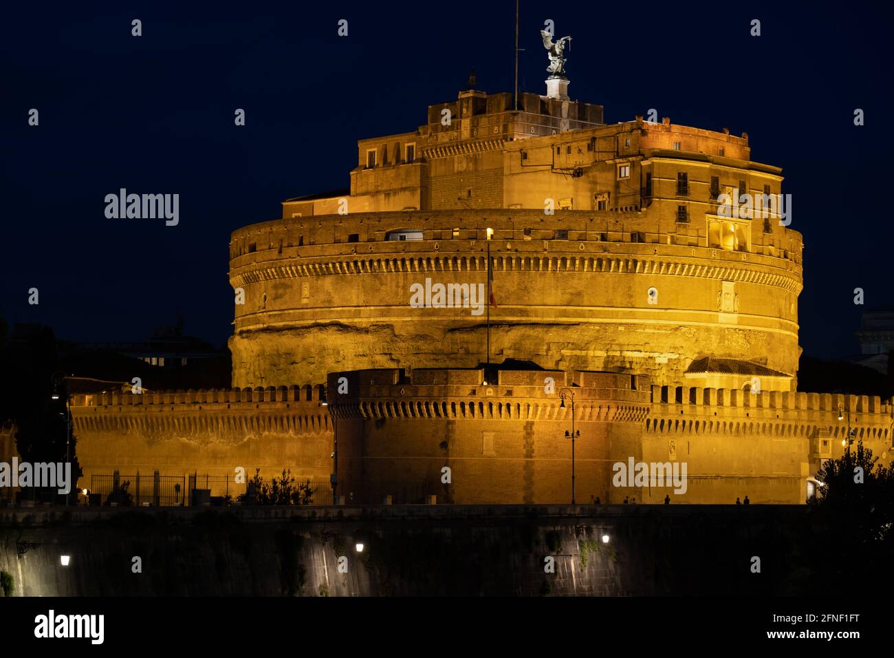 Castle of the Holy Angel (Castel Sant Angelo) by night, ancient Mausoleum of Hadrian in city of ...