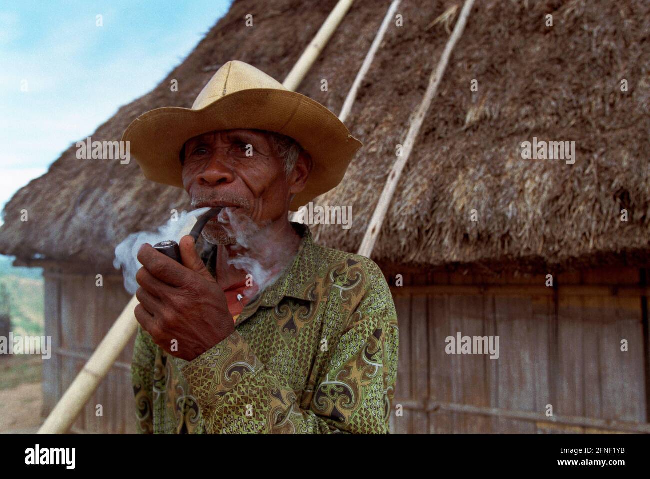 Portrait of an old man in the highlands of East Timor (Ermera District ...