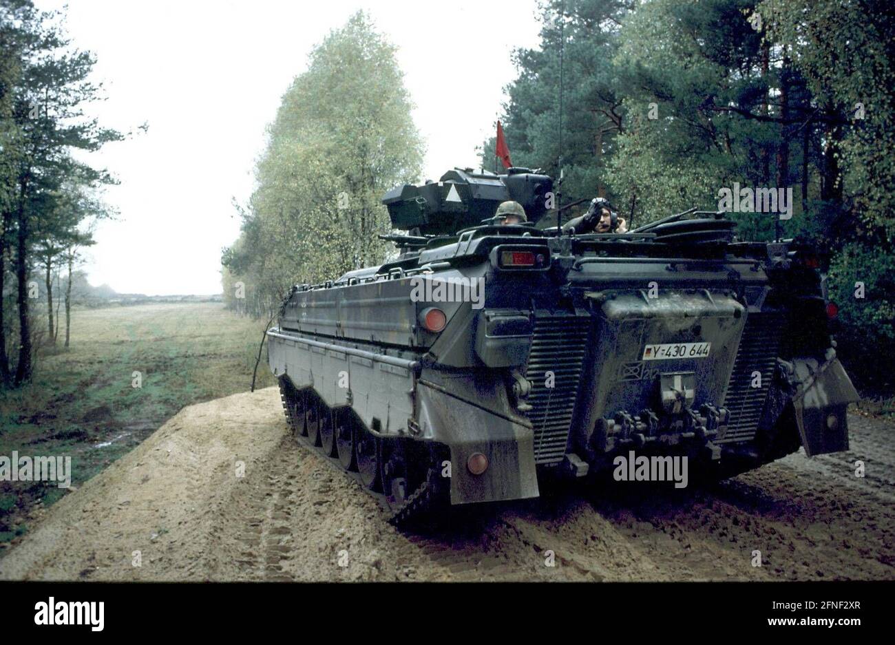 During a maneuver of the German Federal Armed Forces, a marten stands ...