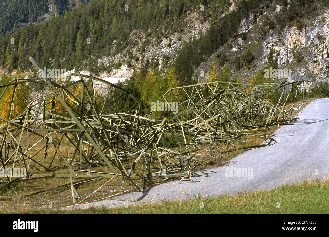 Destroyed power pole on Furnace Pass Road. [automated translation ...