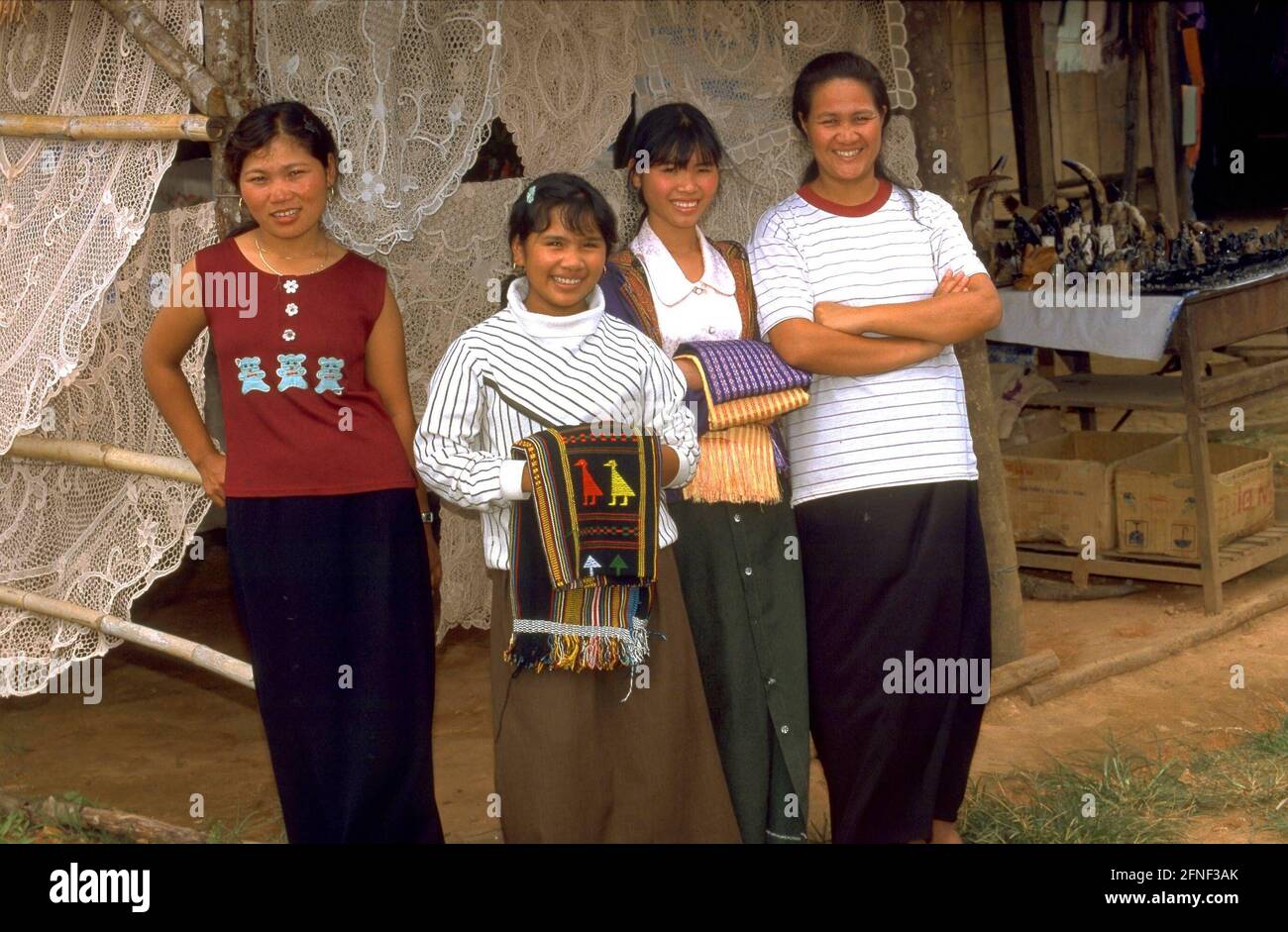 Women of a mountain tribe in a weaving mill near Da Lat. [automated ...