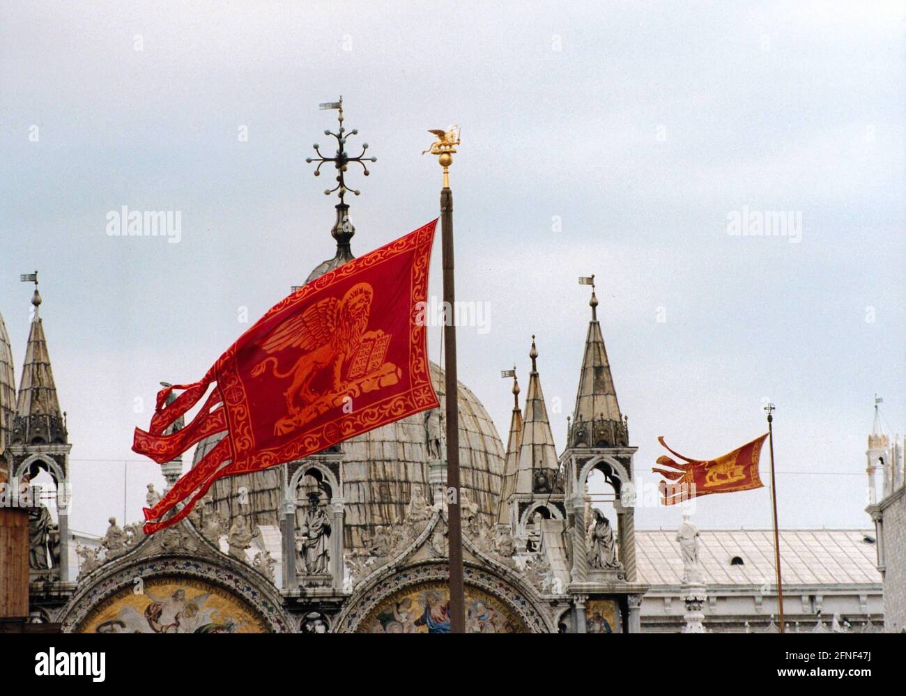 Venetian flag with the golden lion of St. Mark the Evangelist, the city ...