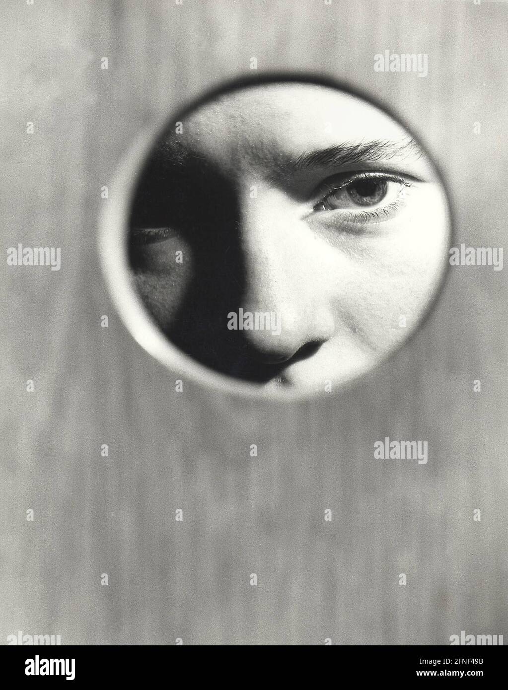 Peephole peeping hi-res stock photography and images - Alamy