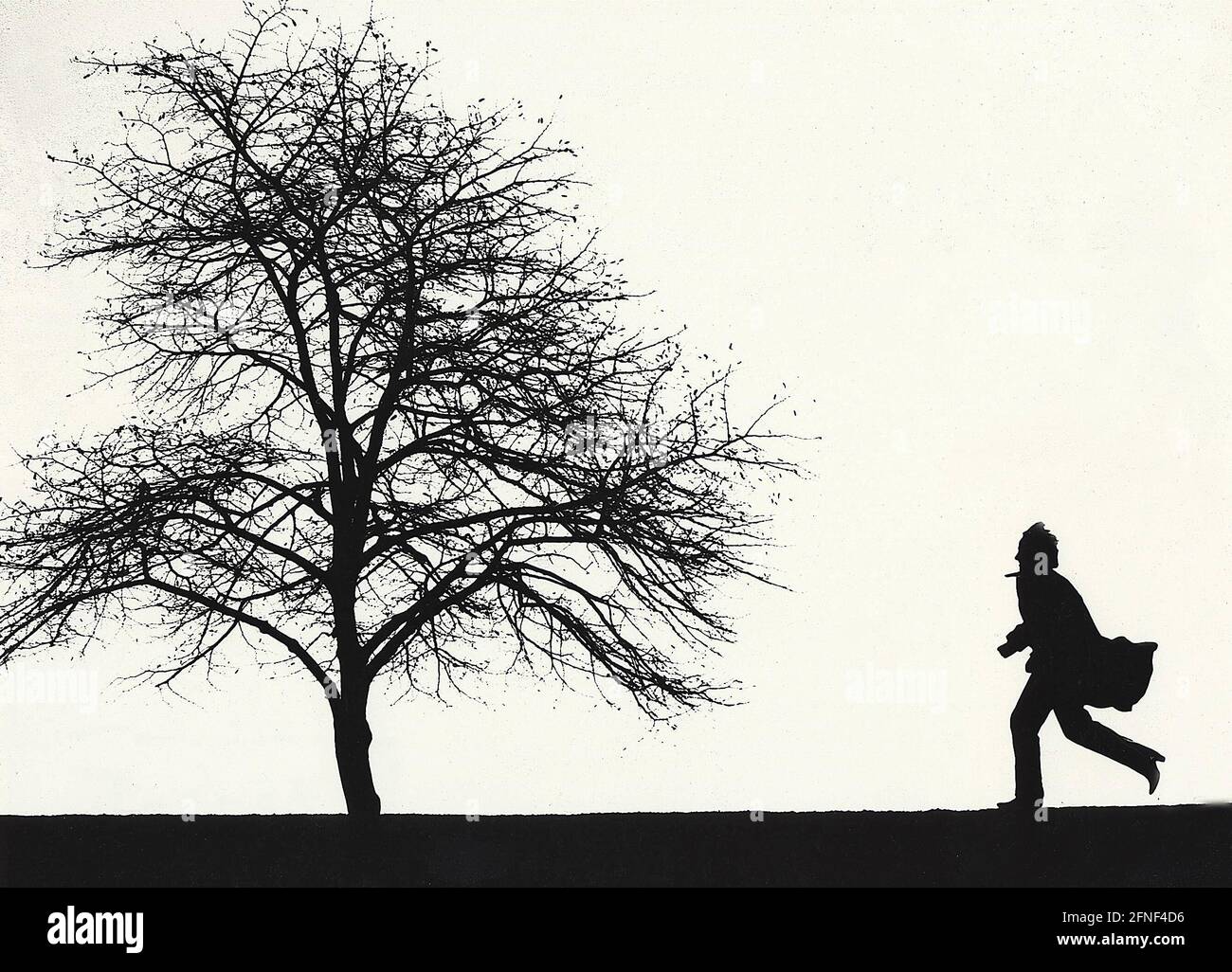 Symbolic photo for stress, hurry and hectic: a running woman ...