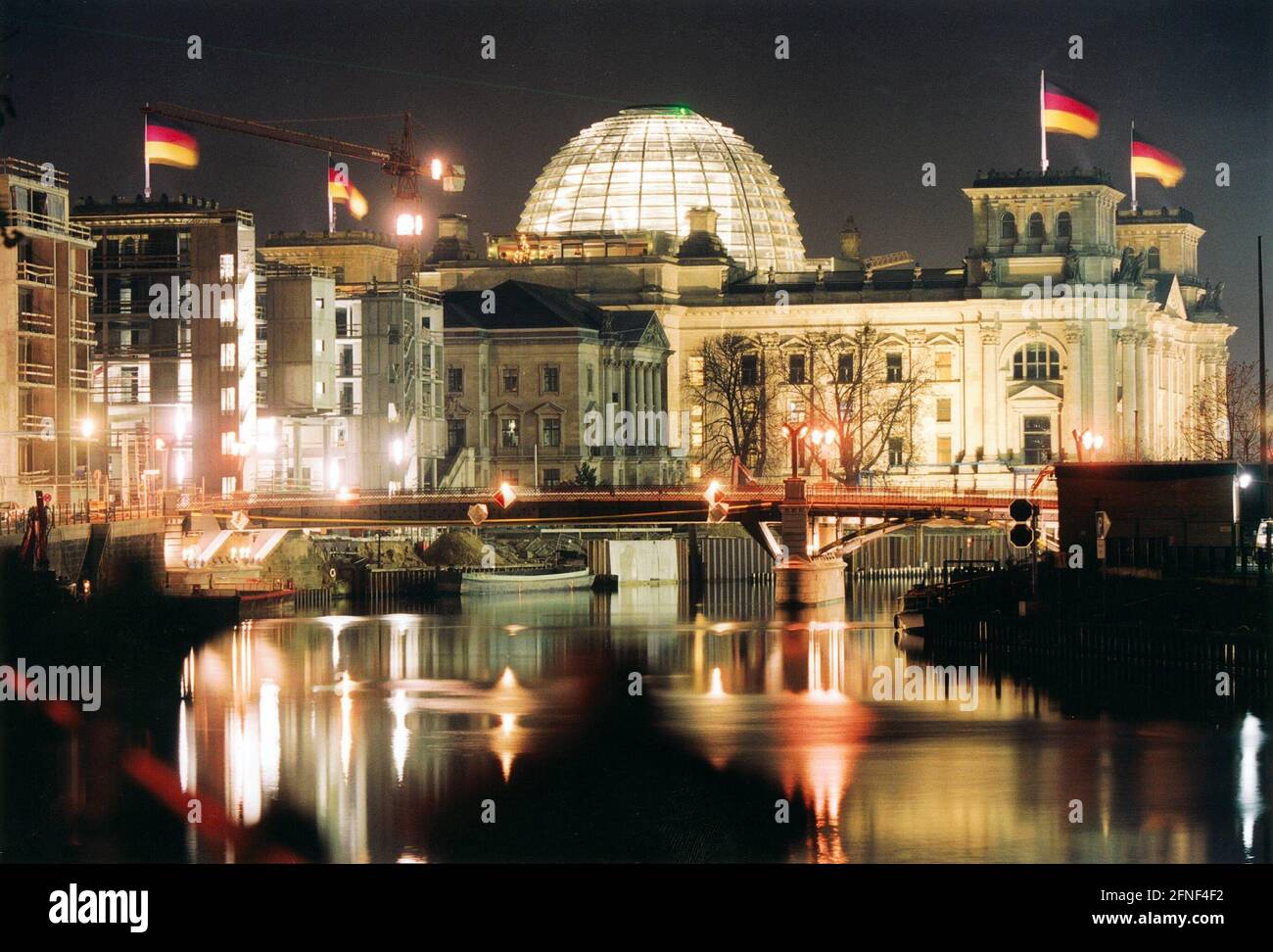 The Berlin Reichstag with Spree and Spree Bridge at night. [automated ...