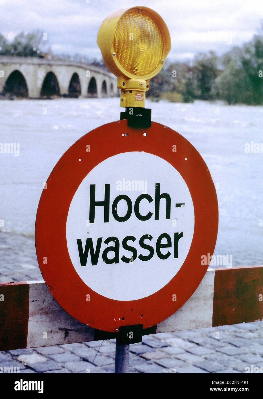 "Warning sign: ""High water"". [automated translation] Stock Photo - Alamy