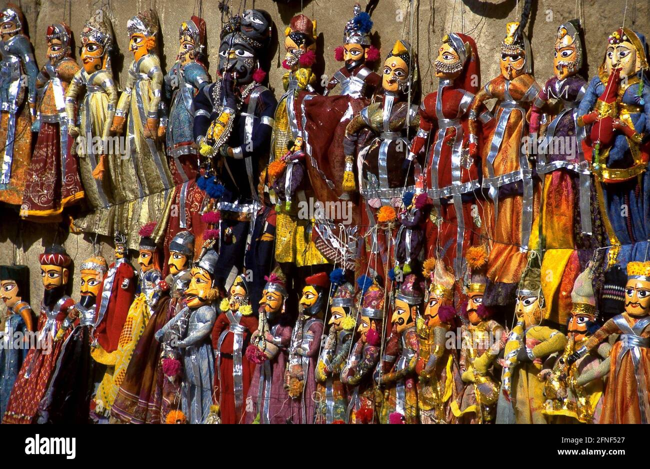 Puppets hung in front of a house wall. [automated translation] Stock ...