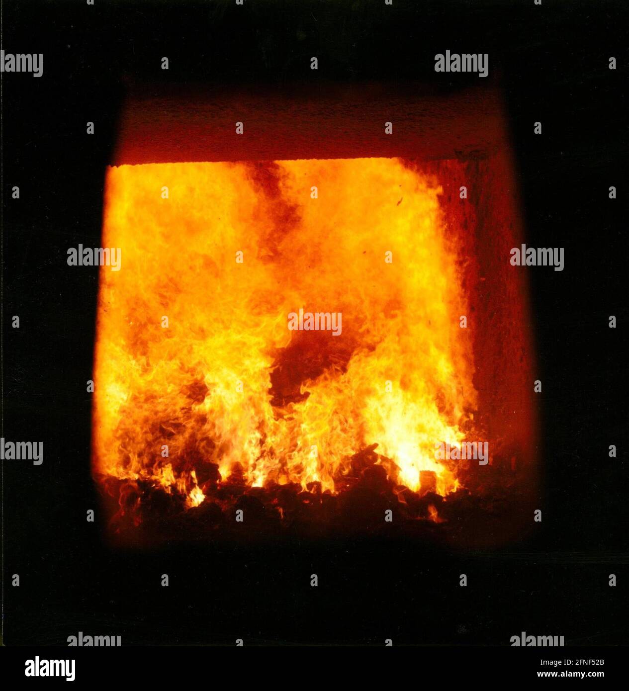 View into the furnace of a waste incineration plant. [automated ...