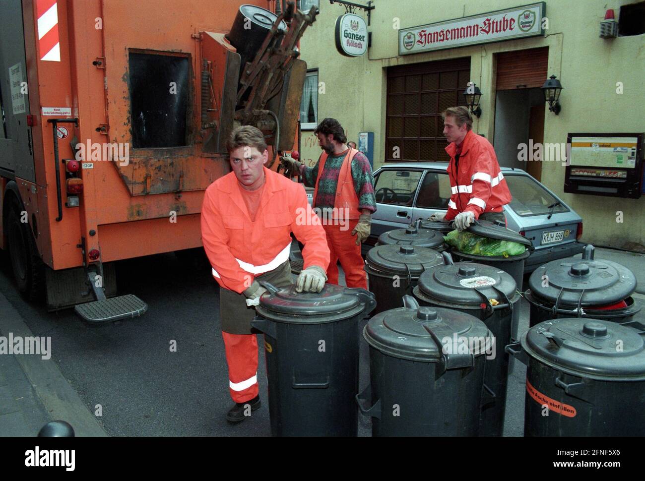 Garbage collection empties garbage cans in the Ehrenfeld district of ...
