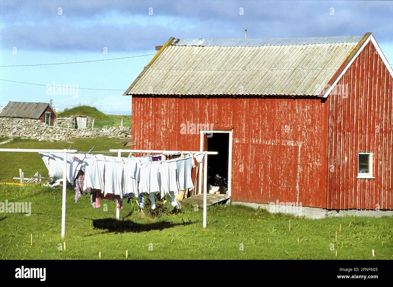 A wooden house serving as a storehouse on Roest, an island in Lofoten ...