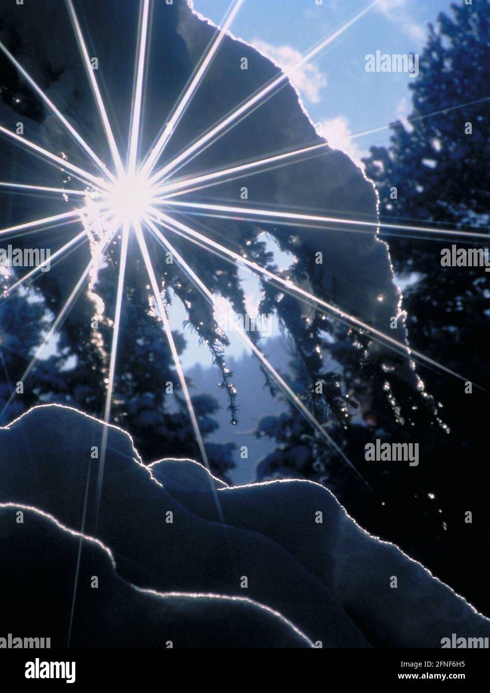 The sun makes its way through ice and snow. [automated translation ...