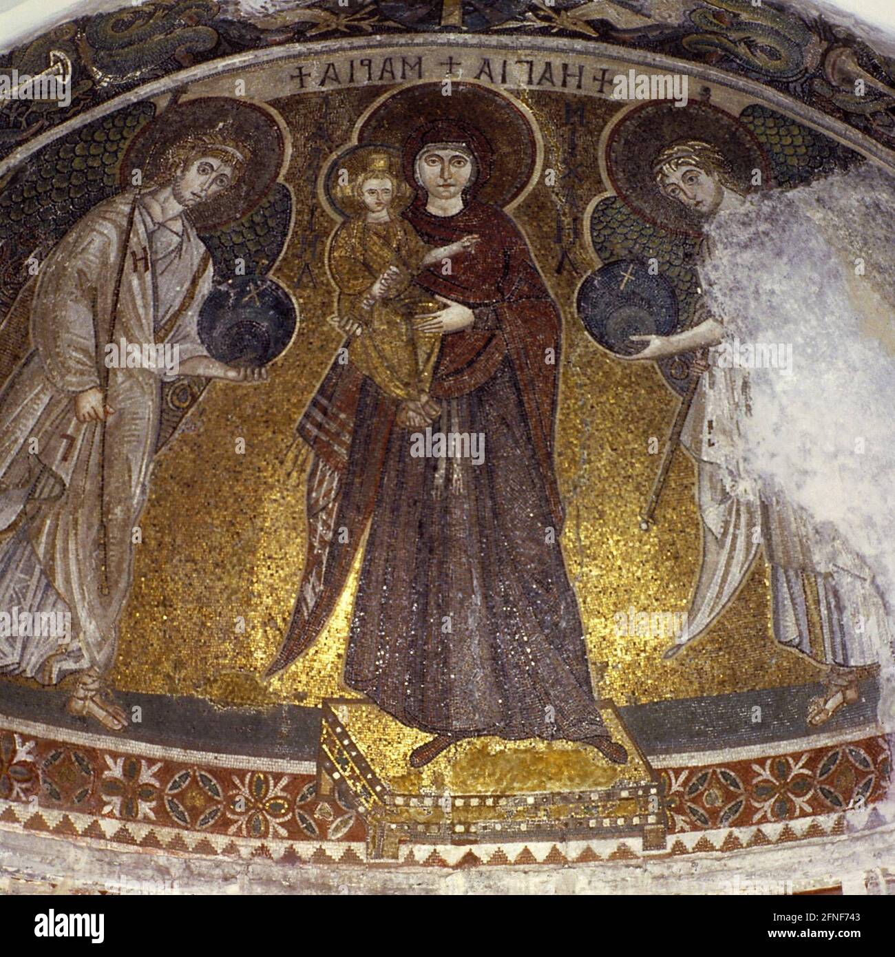 Mosaic with Mary, Christ Child and two angels in an apse of the ...