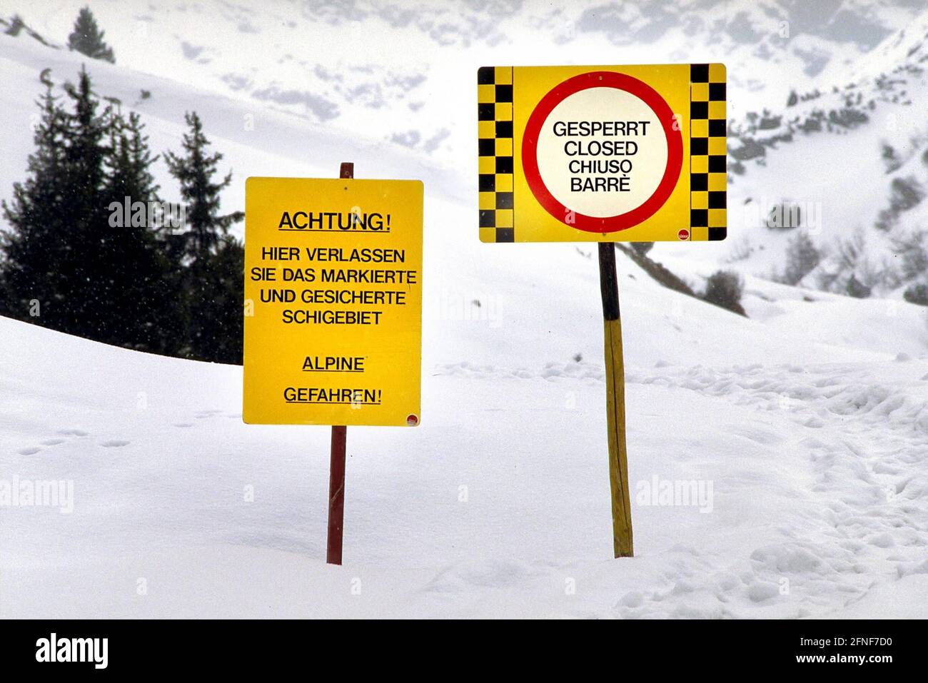 Warning signs in the Ötztal ski area. [automated translation] Stock ...