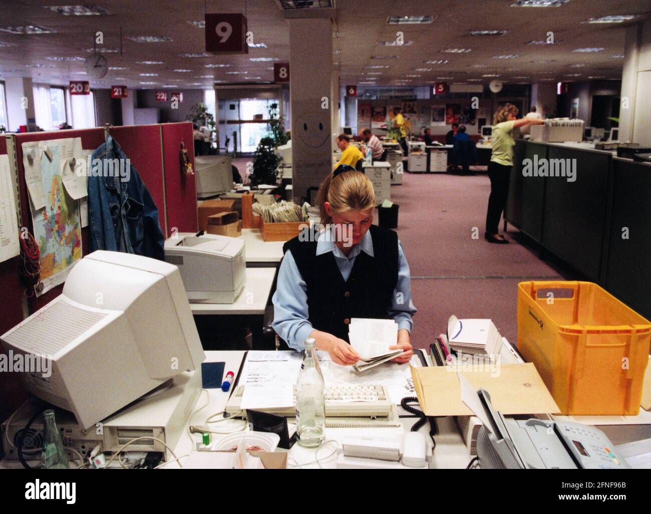 Employee in open plan office (1999). [automated translation] Stock ...