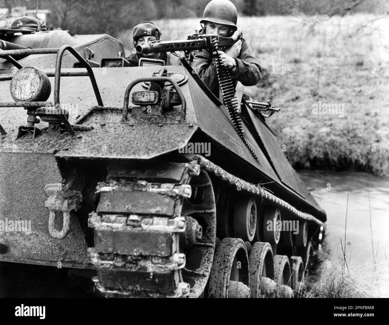 A type HS 60 infantry fighting vehicle, showing a gunner at the MG3 ...