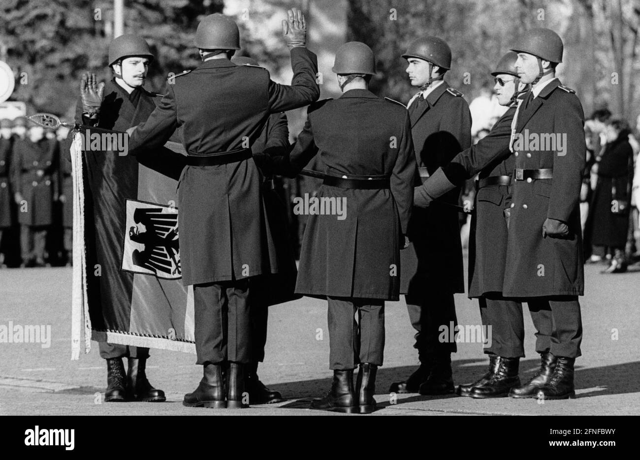 Soldiers of the Air Force Training Regiment take their oath on the flag ...