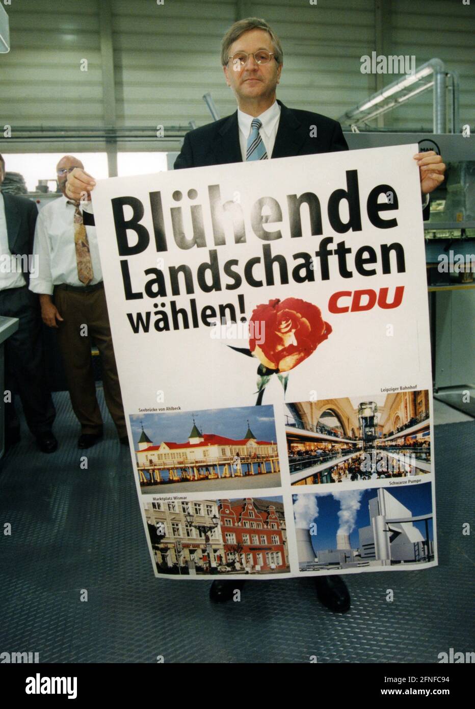 "CDU Secretary General Peter Hintze supervises the printing of the CDU ...