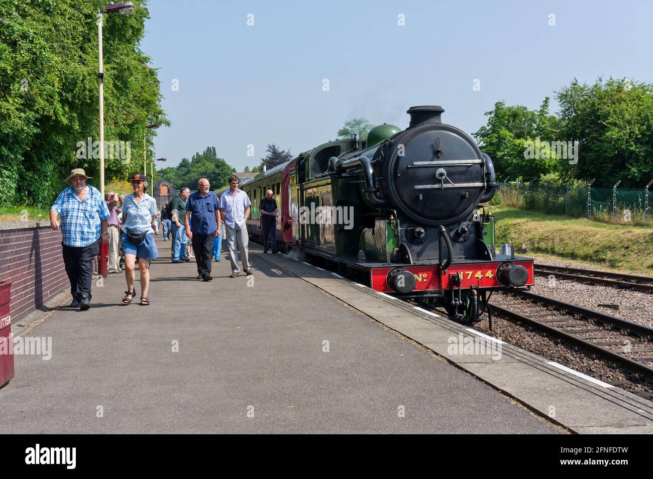 Passengers leaving a steam train at Leicester North station on the ...