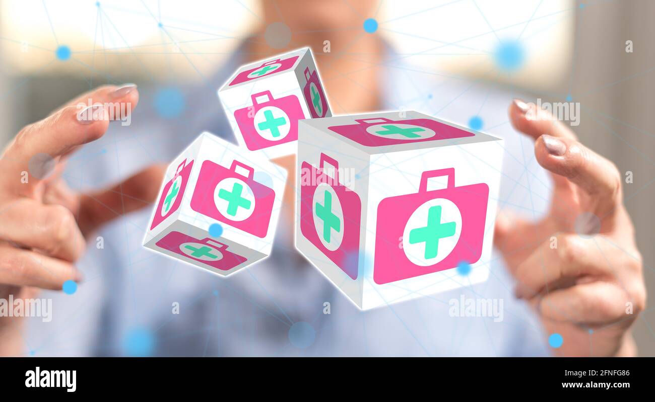 First aid concept between hands of a woman in background Stock Photo ...