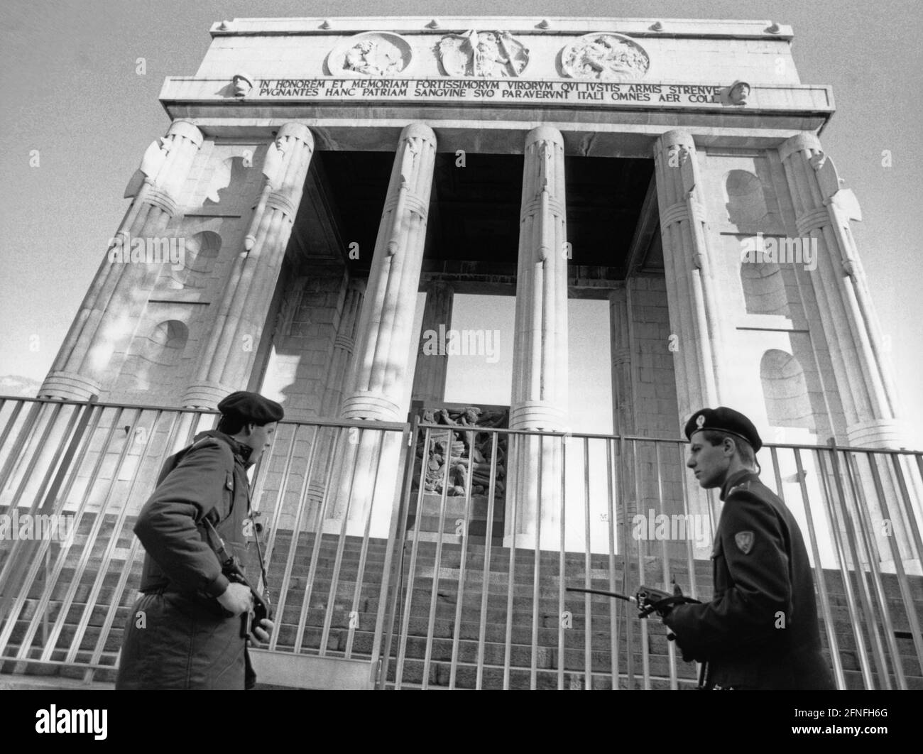 Two Italian policemen guard the Victory Monument in Bolzano. The ...