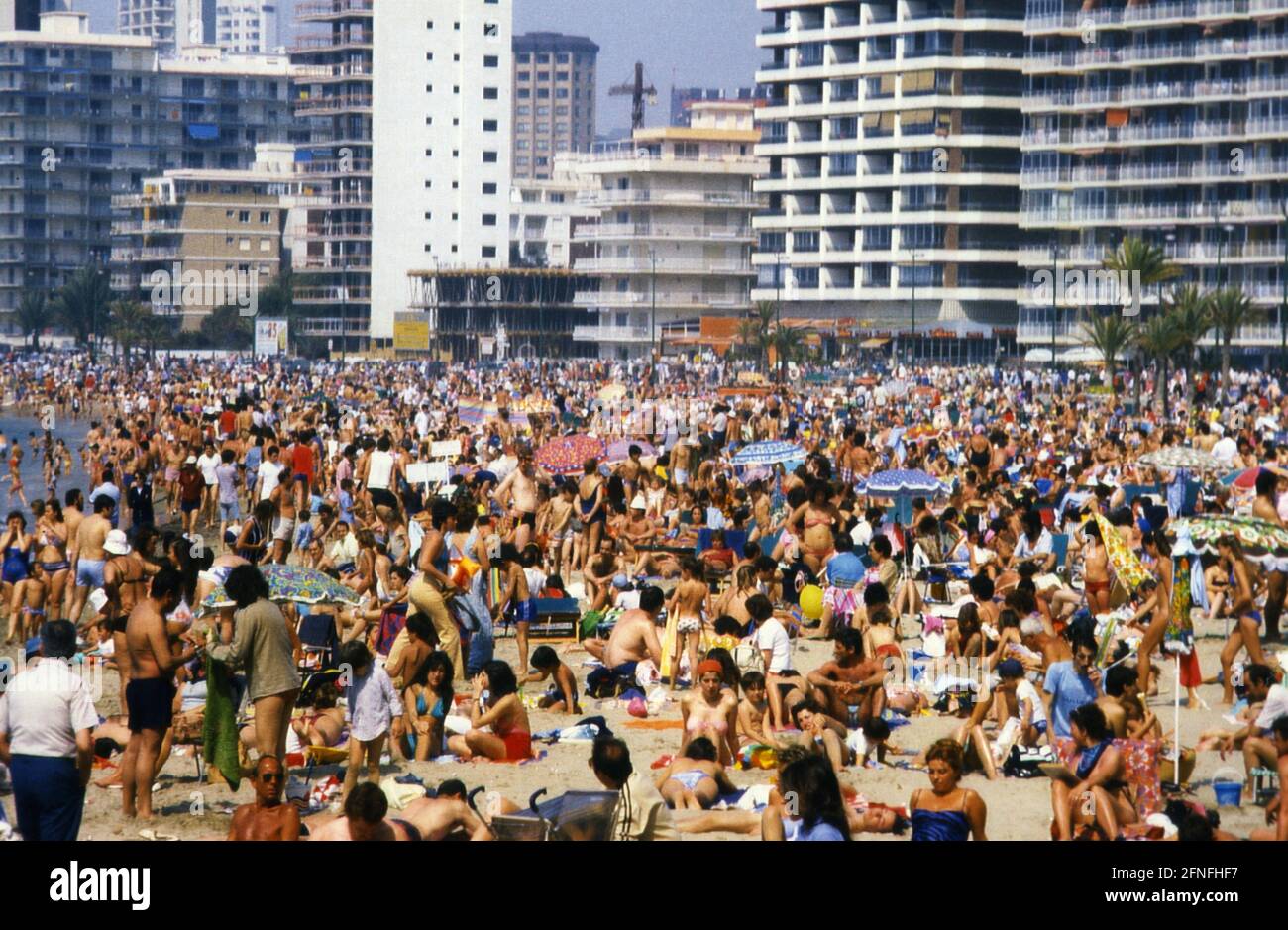 Holidaymakers on the beach of Benidorm. [automated translation] Stock ...