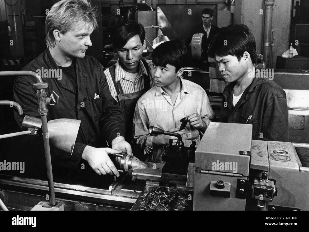 Young migrants from Vietnam with their trainer at Niles ...