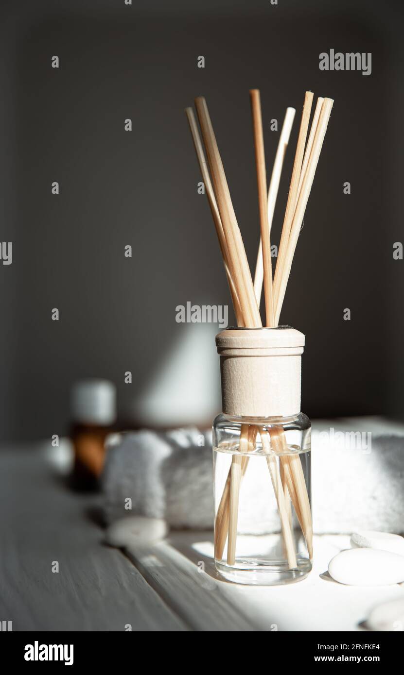 Home fragrance with sticks in the interior of the room close-up Stock ...