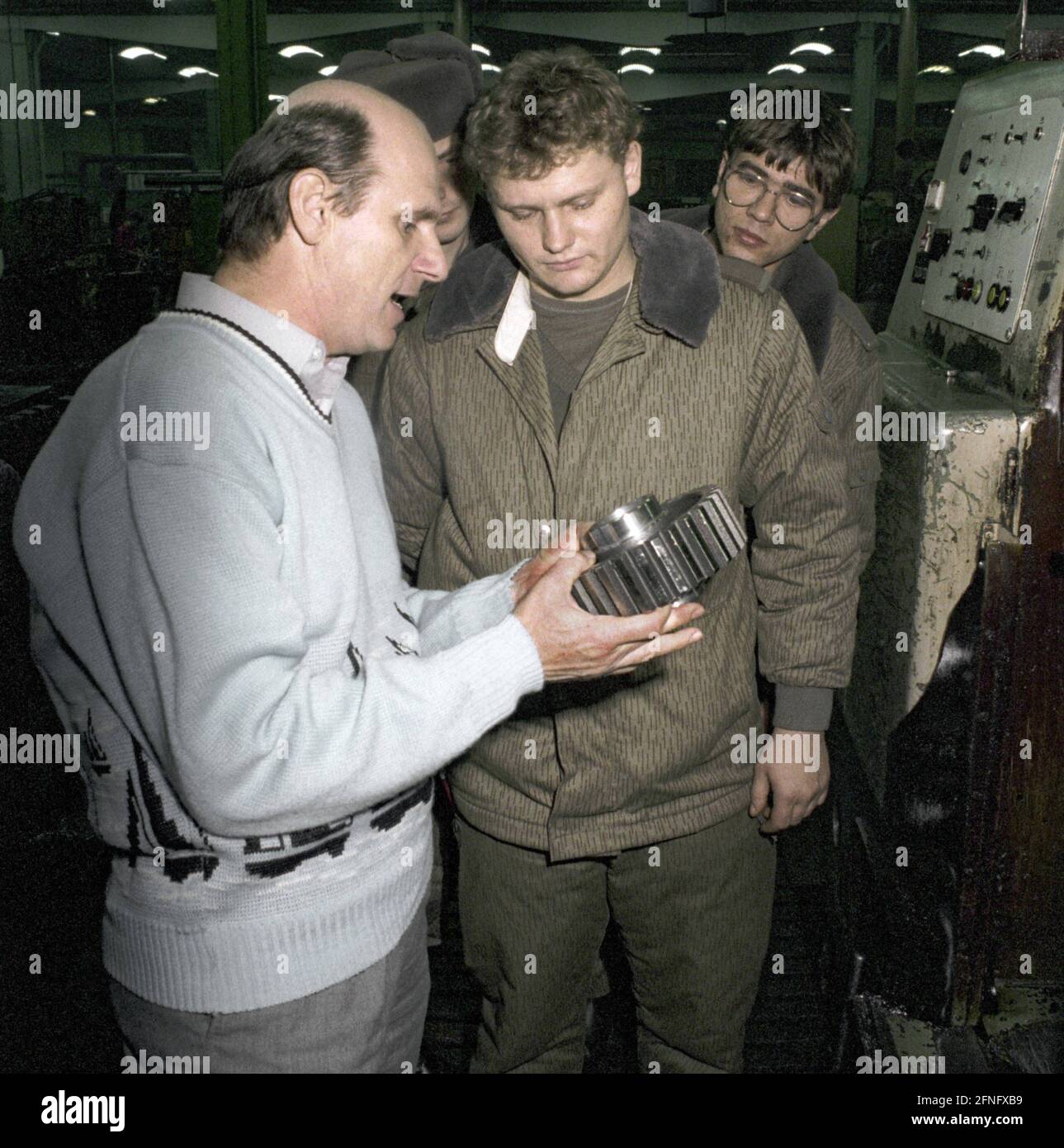 Military uniform production hi-res stock photography and images - Alamy