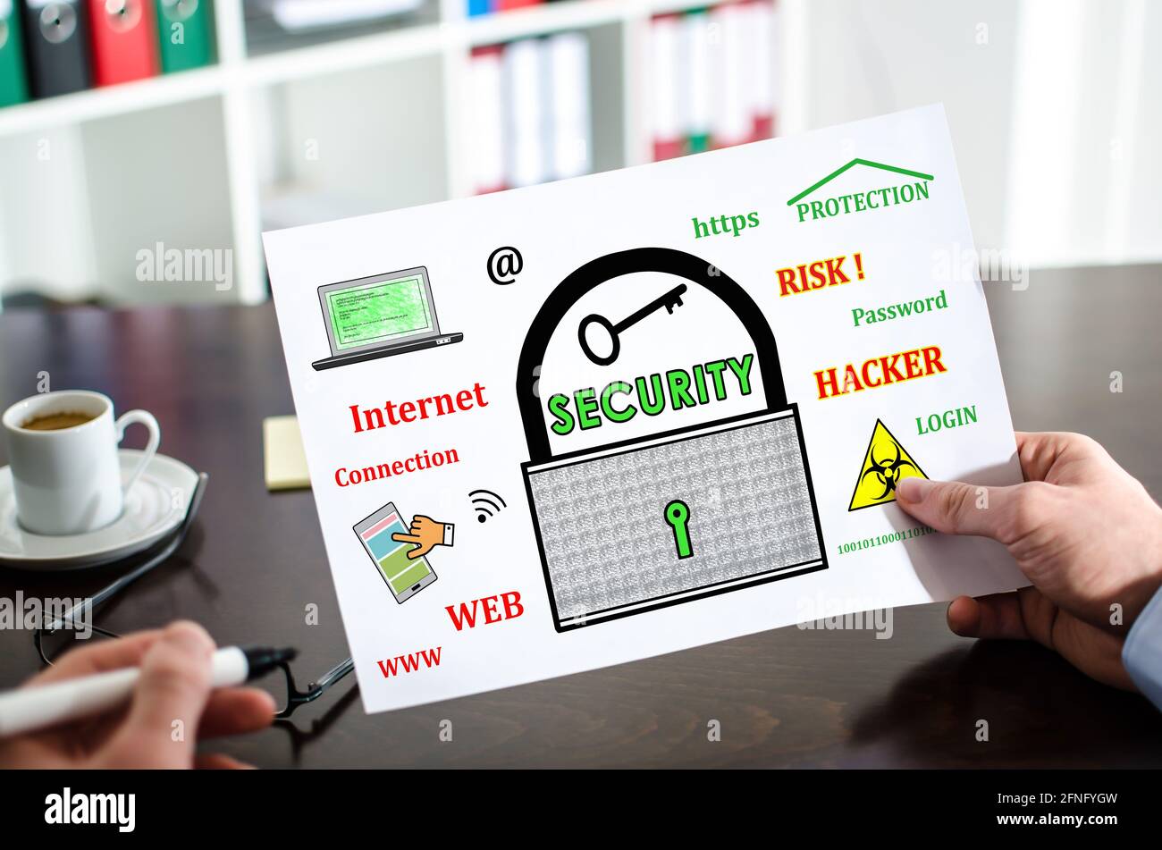 Hand holding a paper showing data security concept Stock Photo - Alamy