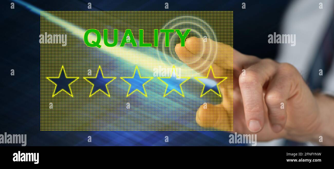 Man touching a quality concept on a touch screen with his finger Stock ...