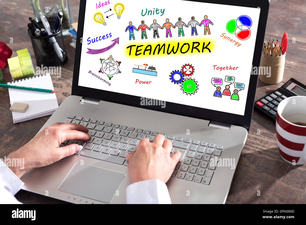 Teamwork concept shown on a laptop screen Stock Photo - Alamy