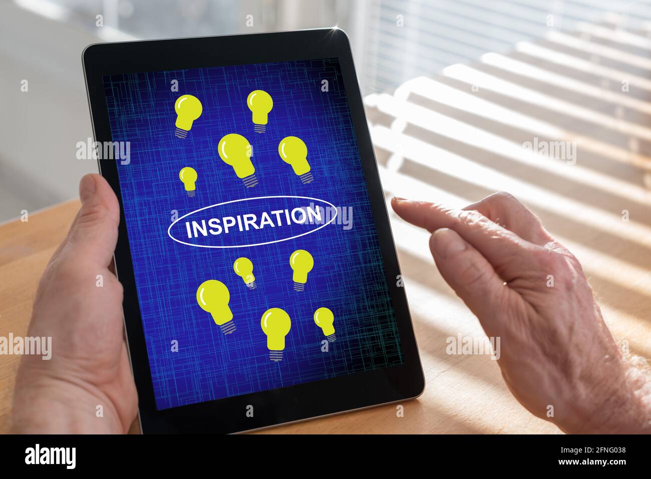 Tablet screen displaying an inspiration concept Stock Photo - Alamy