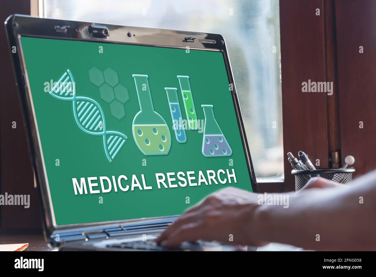 Laptop screen displaying a medical research concept Stock Photo - Alamy